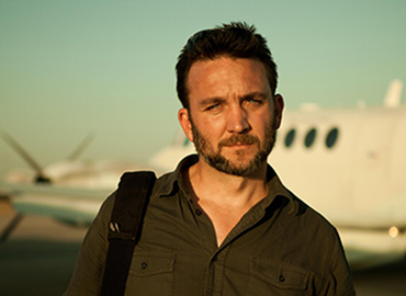 Josh Rushing: journalist, photographer, author, public speaker.